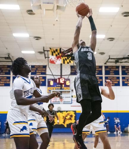Football standout Rodriguez provides reminders of his hoops skills in ...