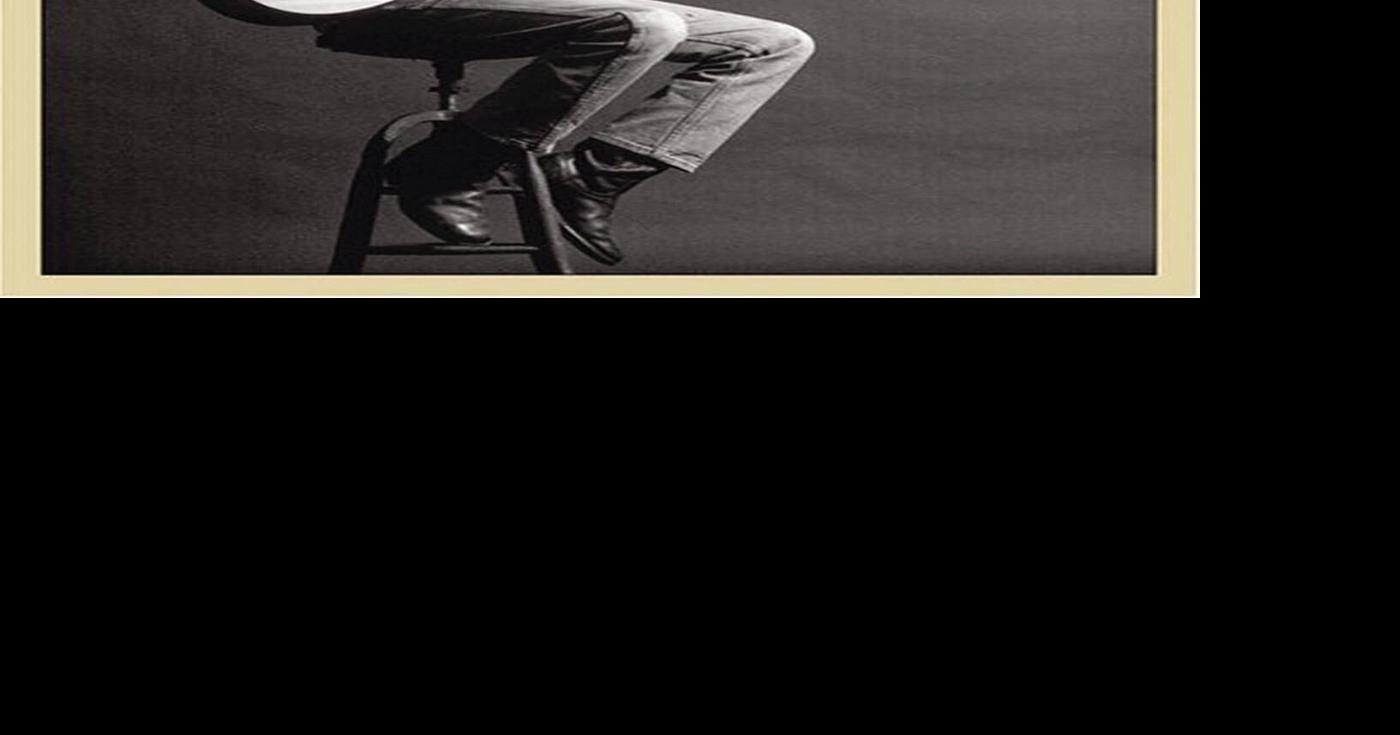 Jim Croce on stool.jpg | | fredericknewspost.com