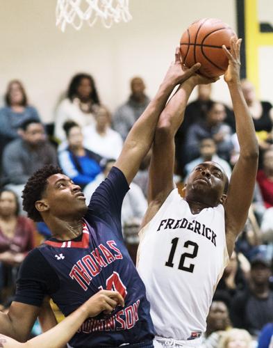 Slideshow of Frederick vs. Gov. Thomas Johnson basketball | Sports ...