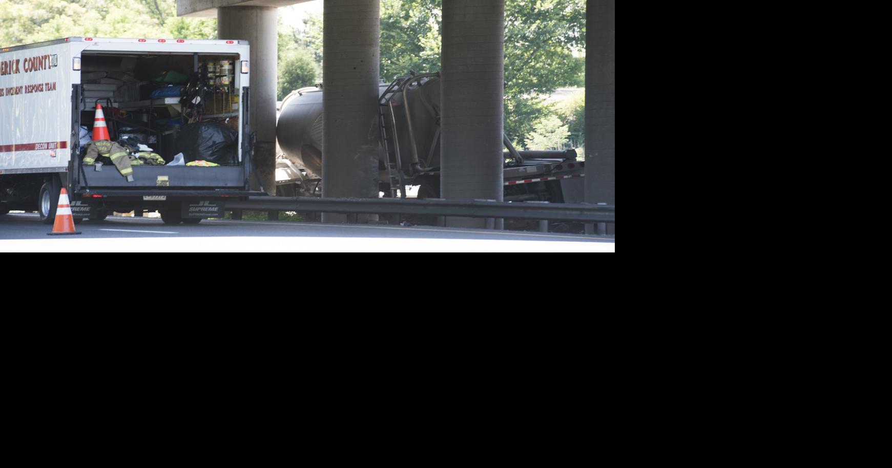 Merging car caused tractor-trailer to overturn on I-270 at I-70 ...