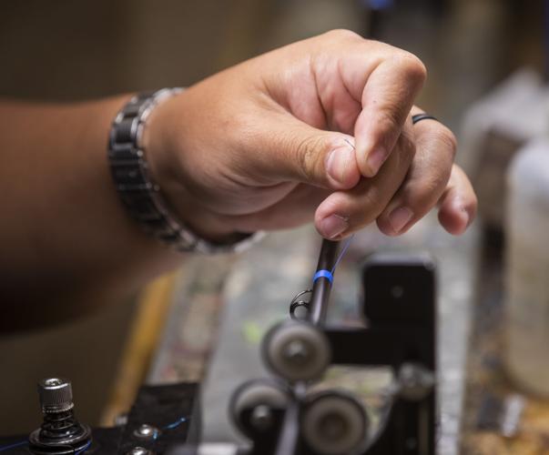 Biz Buzz: League City reels in custom rod store; twins debut coastal ...