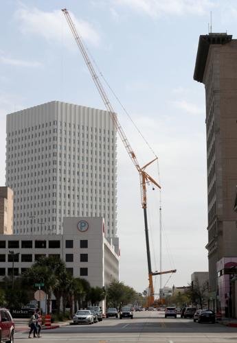 Massive crane towers over American National building | Local News | The ...