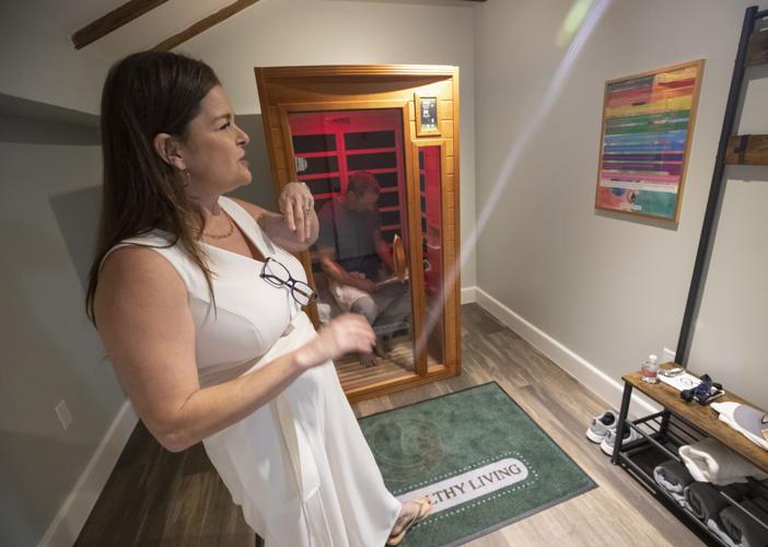 Tannos tops off $23 million office building; islander opens dream ...