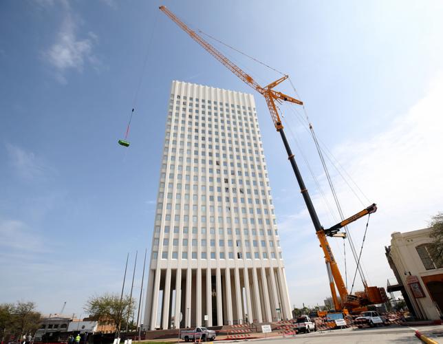 Massive crane towers over American National building | Local News | The ...