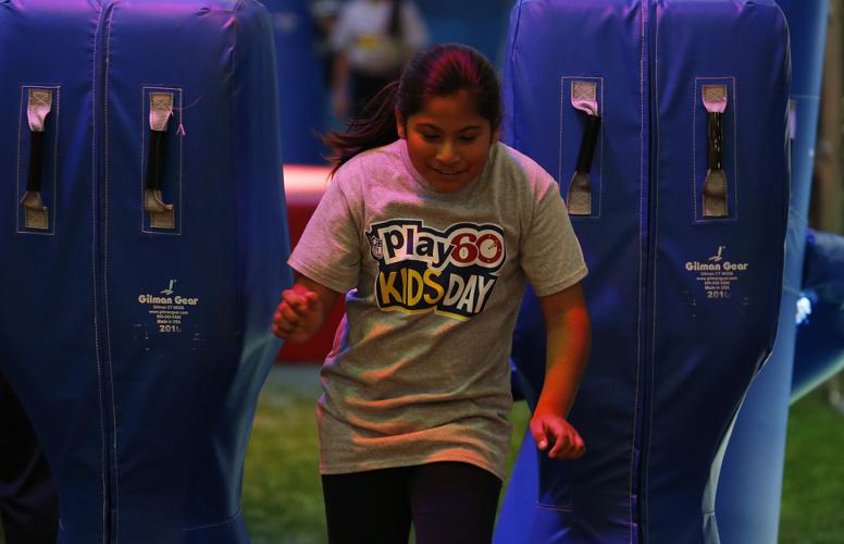 Photos: NFL PLAY 60 Kids' Day | In Focus | The Daily News