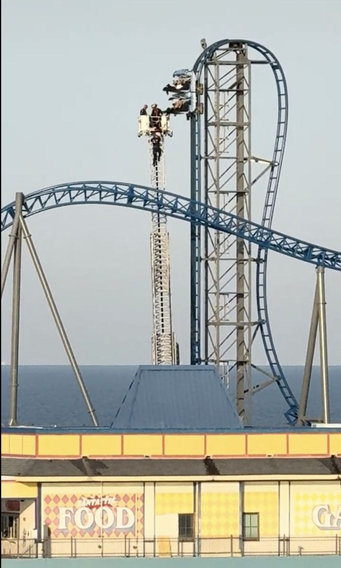 BREAKING: Riders stranded atop Shark Bite coaster at Pleasure Pier ...