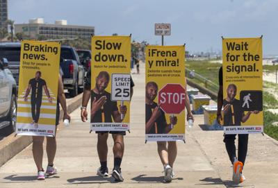 Campaigners take to Galveston's seawall to slow down drivers | Local ...