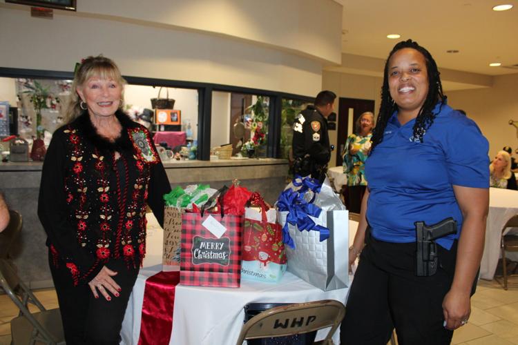 Seaside Scenes: Cops meet their 'adopters' at Christmas feast ...