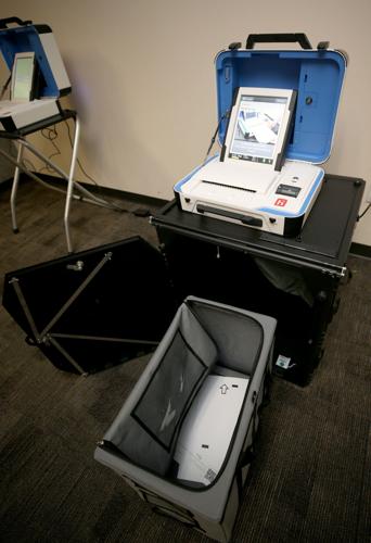 Galveston County rolls out paper ballot machines | Local News | The ...