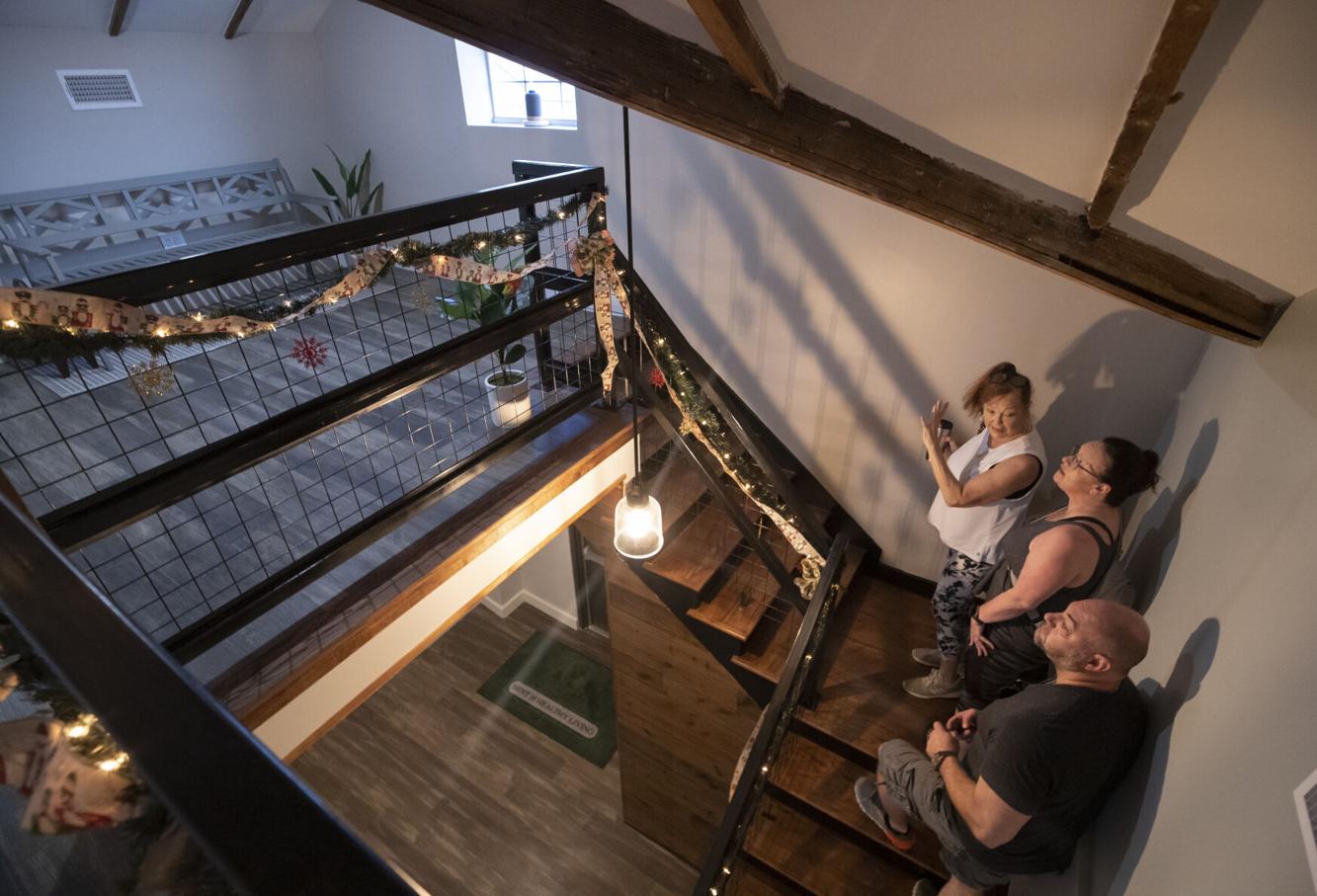 Tannos tops off $23 million office building; islander opens dream ...