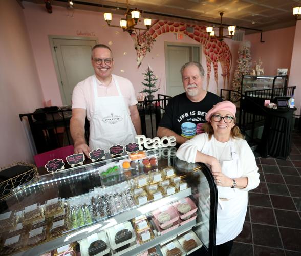 Tannos tops off $23 million office building; islander opens dream ...