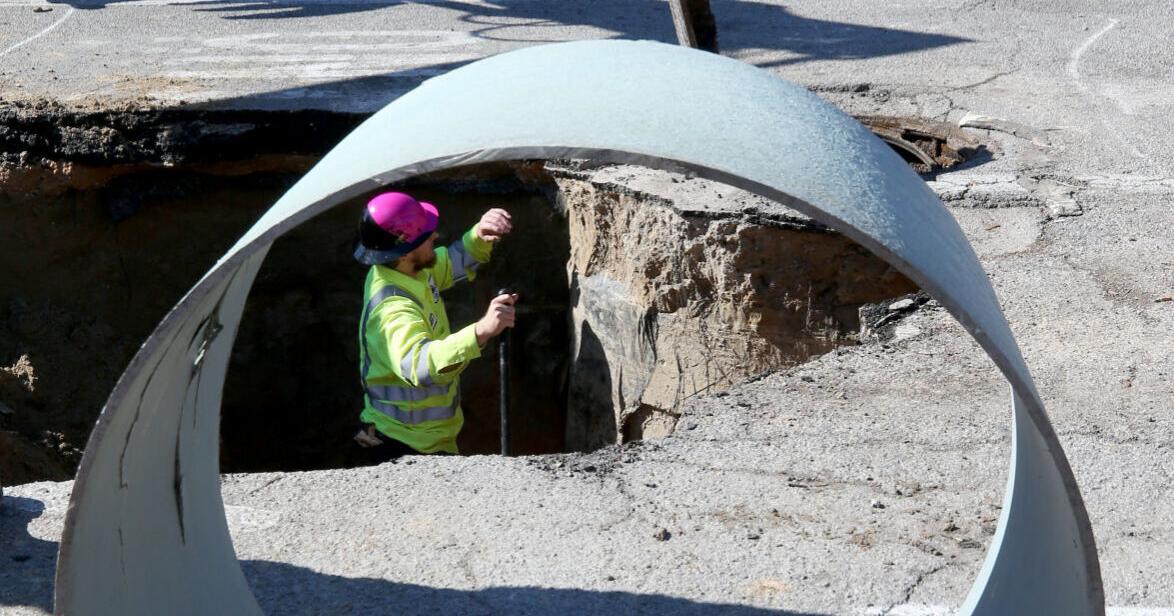 City works to repair 51st Street hole | Local News | The Daily News