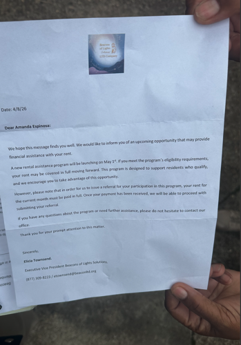 Amanda Espinosa holds a Beacons letter outlining a possible new rental ...
