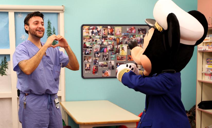 Disney Cruise Line's Mickey Mouse visits kids at Shriners Hospitals ...
