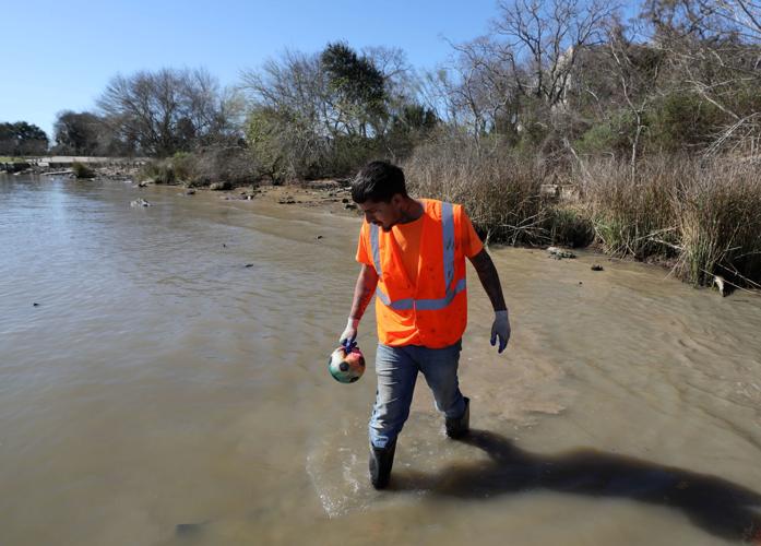 Volunteers work a Saturday morning creek clean up | Local News | The ...