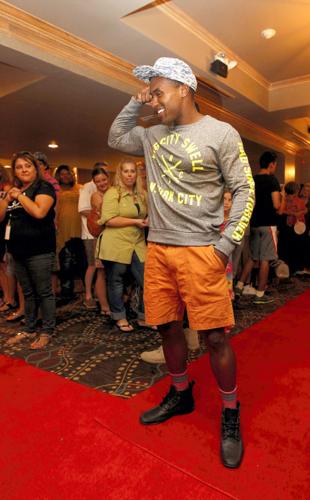 Models strut their stuff for Glamour for Grammar despite rain | Local ...