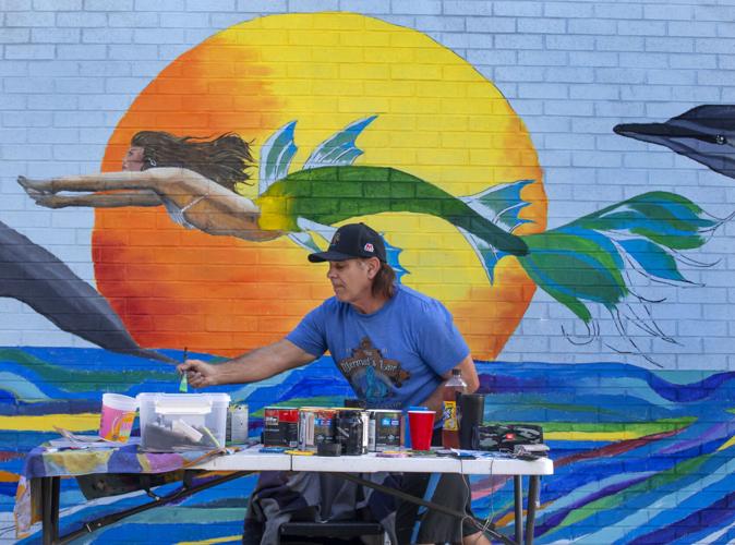 Galveston County artist creates mythical mural at the Sunshine Center ...