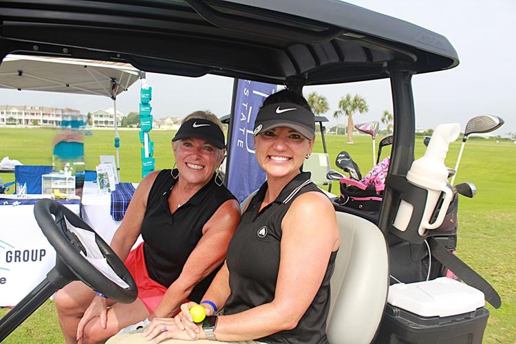 Out and About: Golf tournament a success despite bad weather ...