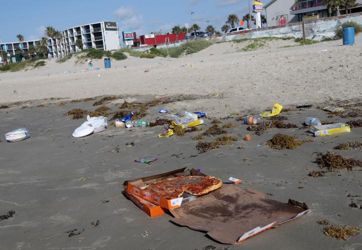 In Galveston, dawn's early light reveals 100 tons of beach trash ...