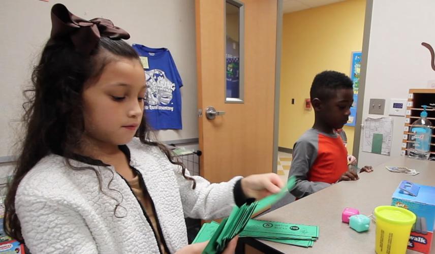 Gator bucks helping students practice financial skills at Calder Road ...