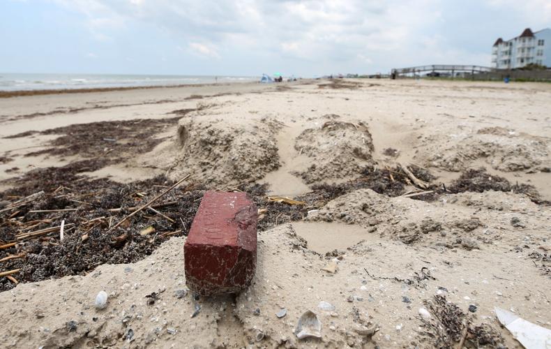 Rusted metal, concrete came with $6.8M worth of beach sand, islander ...