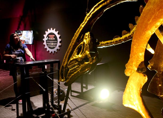 Interactive dinosaur exhibit on display at Moody Gardens | Leisure ...