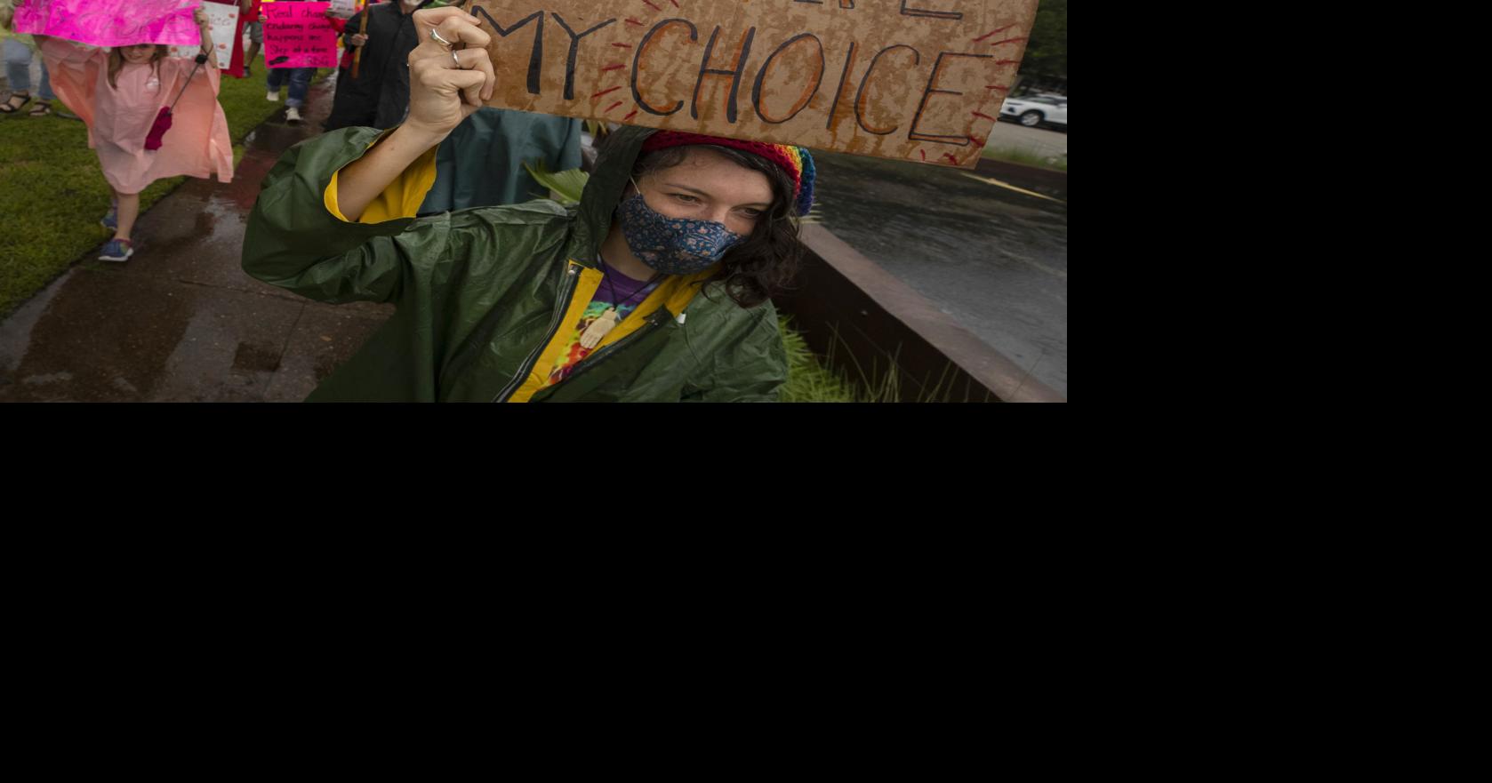 Crowd gathers in Galveston to march for reproductive rights as part of ...