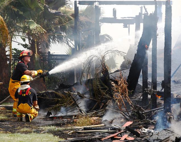 Raging fire destroys house on Tiki Island | Local News | The Daily News