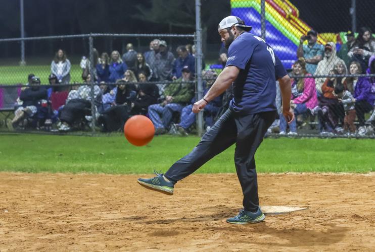League City’s fire, police departments face off in charity kickball ...