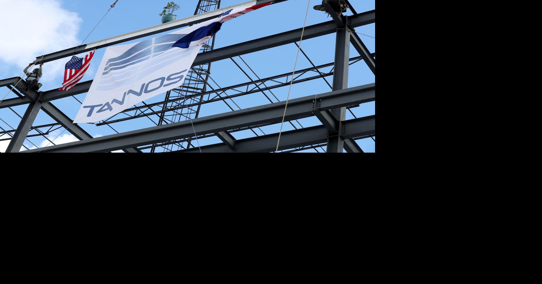 Tannos tops off $23 million office building; islander opens dream ...