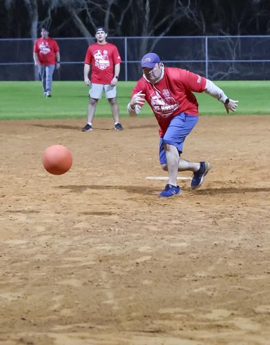 League City’s fire, police departments face off in charity kickball ...