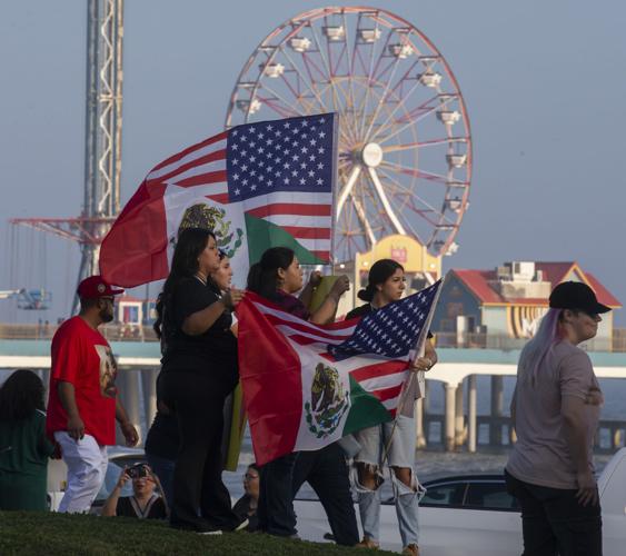 Galveston residents protest nationwide immigration raids | Local News ...