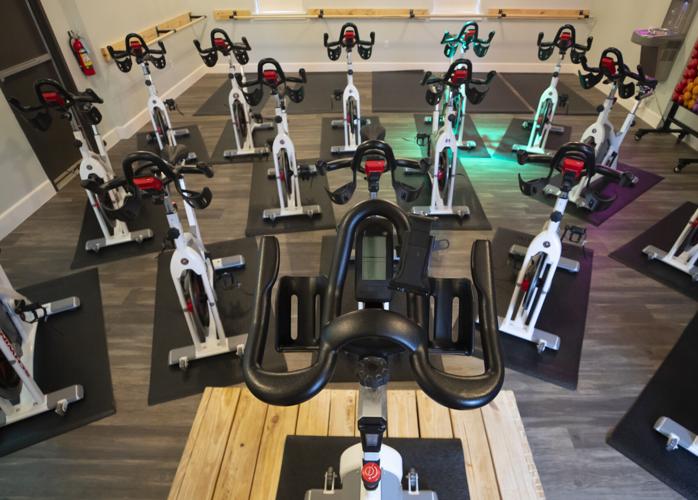 Tannos tops off $23 million office building; islander opens dream ...