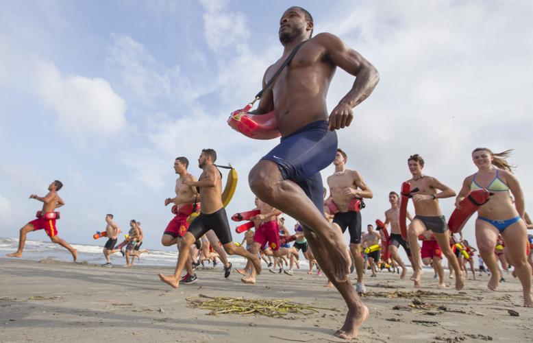 Photos: Galveston Island Beach Patrol "Night Swim" | In Focus | The ...