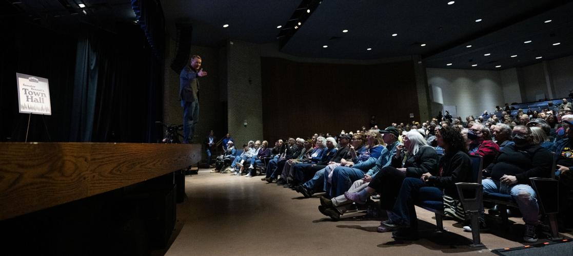 Sen. Bennet sees a more subdued crowd in Colorado Springs after tense ...