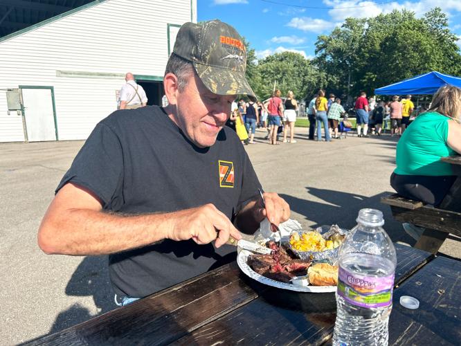 Steak for scholarships. Annual cookout benefits youth who show beef at ...