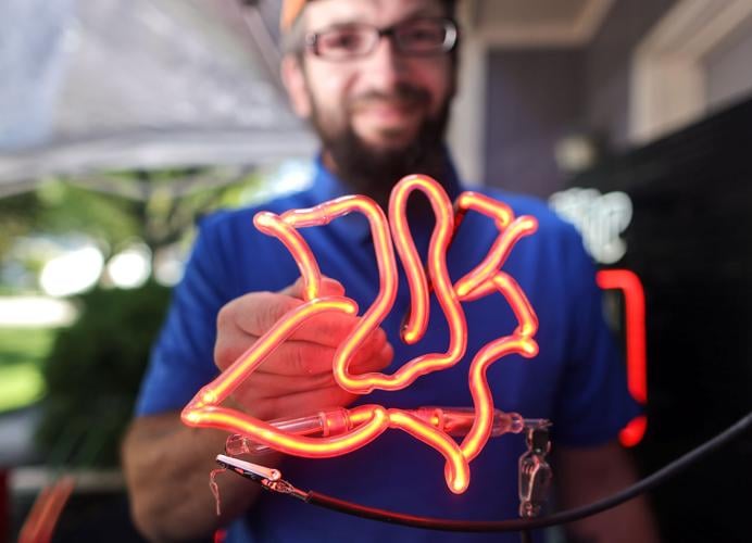 Janesville native turns swirled glass tubes into neon works of art ...