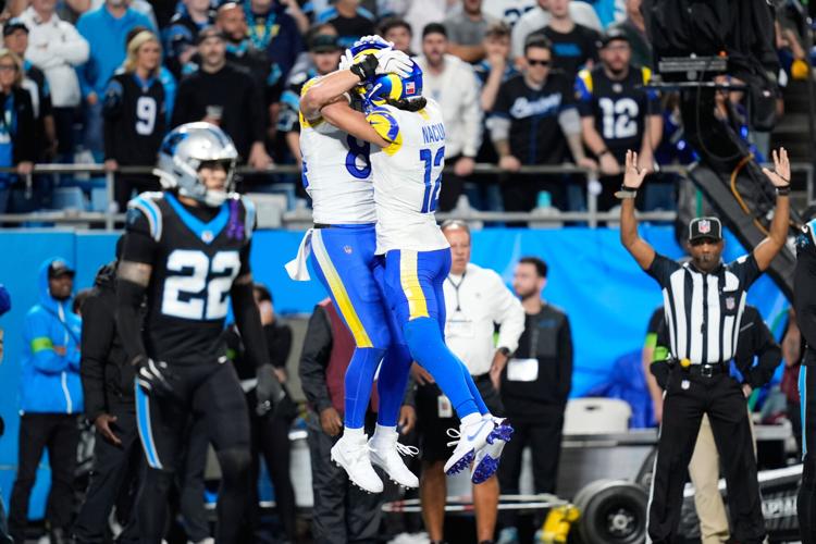 Rams rally past Panthers to open NFL playoffs, advance to divisional ...