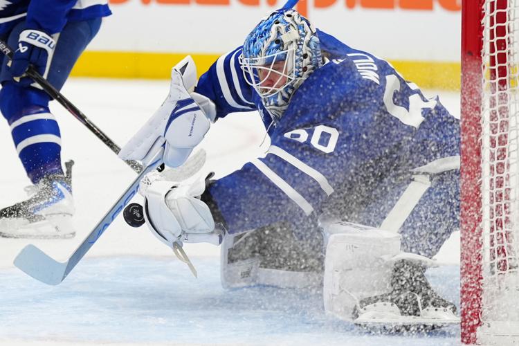 Woll earns 1st shutout of the season as Maple Leafs send Devils to ...