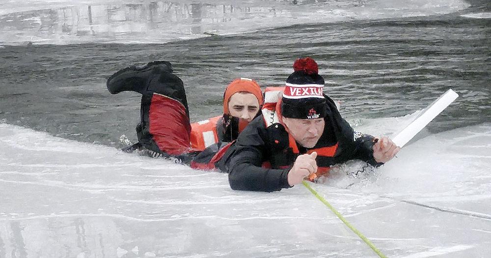 Experts demonstrate how to survive falling through the ice | Archives ...