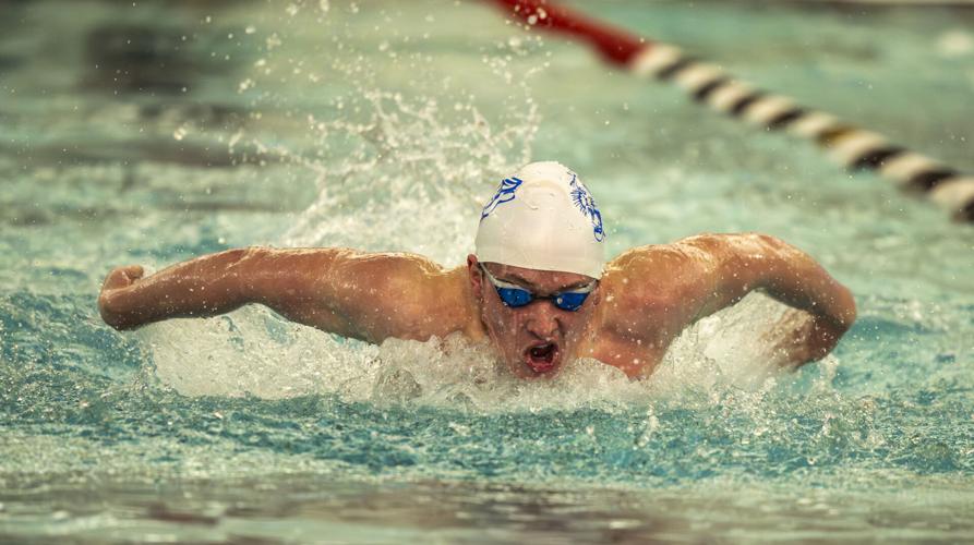 Boys' High School Swimming: Cougars make it four in a row at Rock ...