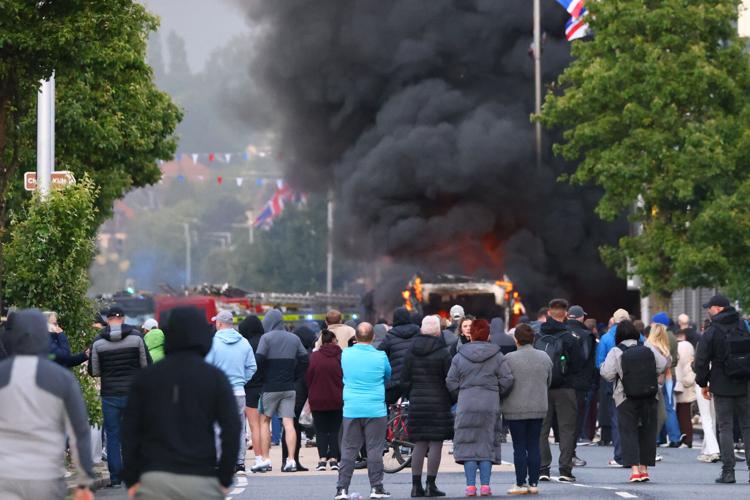 UK leaders call for calm as protests break out after Belfast street ...
