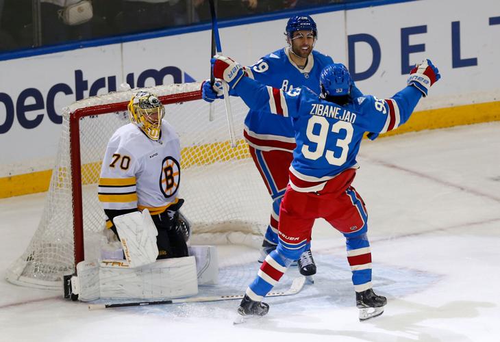 Matthew Robertson scores in OT to lift the Rangers over the Bruins 4-3 ...