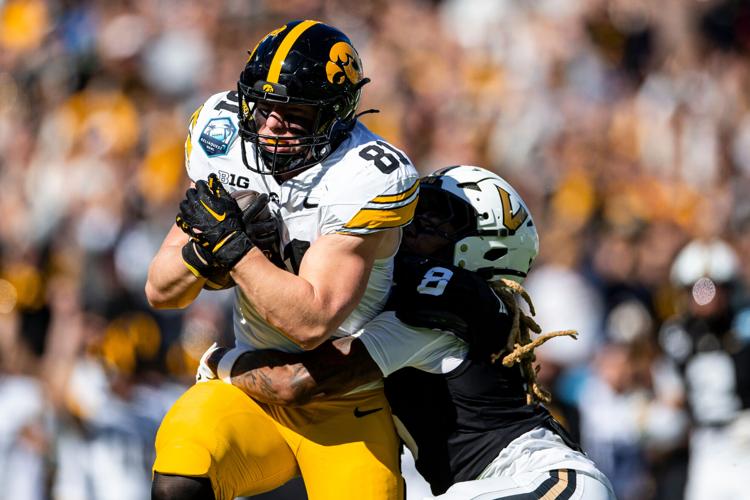 Iowa holds off Vanderbilt's comeback bid for 34-27 victory in the ...