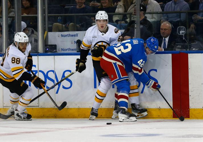 Matthew Robertson scores in OT to lift the Rangers over the Bruins 4-3 ...