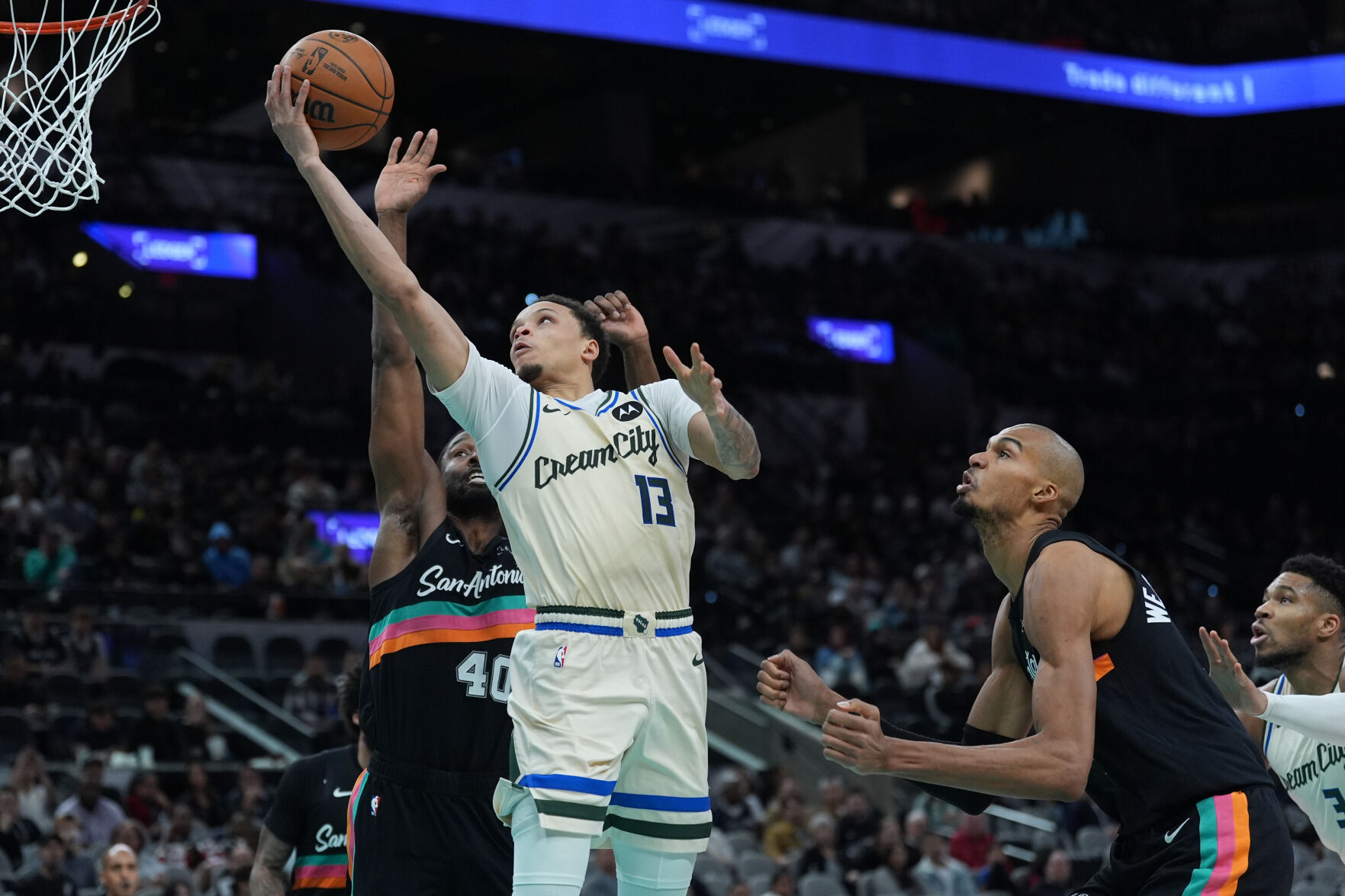 Wembanyama returns from injury scare to fuel Spurs past Bucks, 119-101 ...