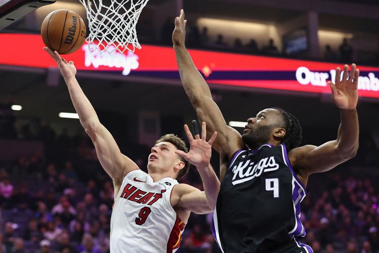 Adebayo, Powell lead hot-shooting Heat past the Kings for a 130-117 ...
