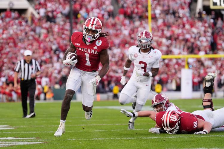 Strong ground games propel No. 1 Indiana and No. 5 Oregon to CFP ...