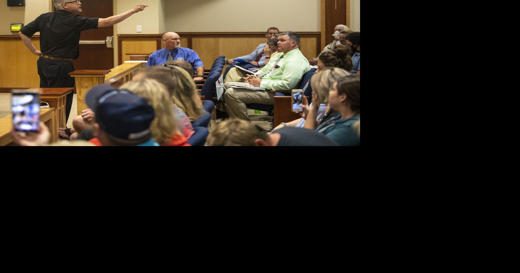 Municipal court judge resigns, sparks shouting showdown at City Council ...