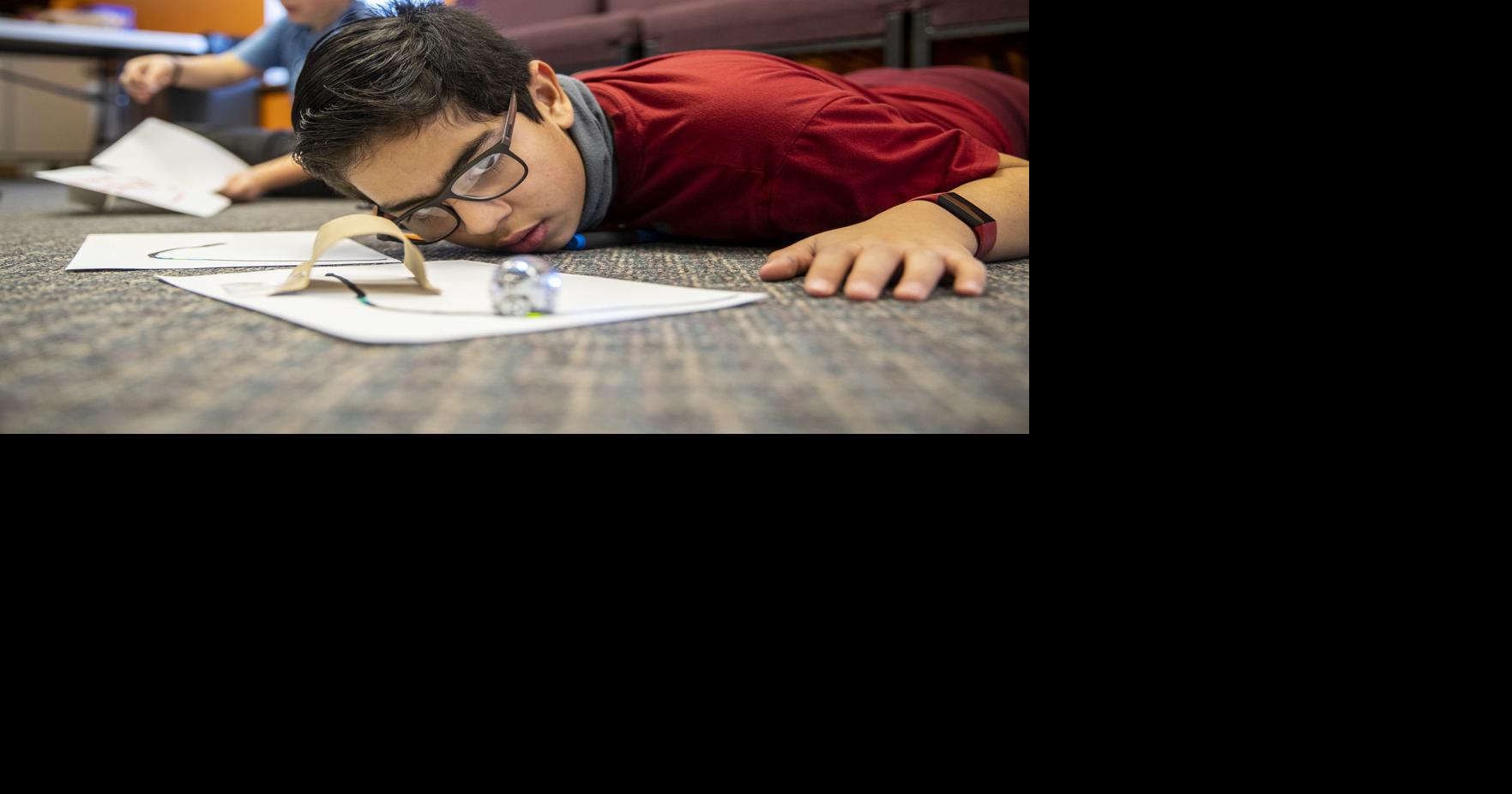 YES House introduces students to STEM with robots donated by Devon ...